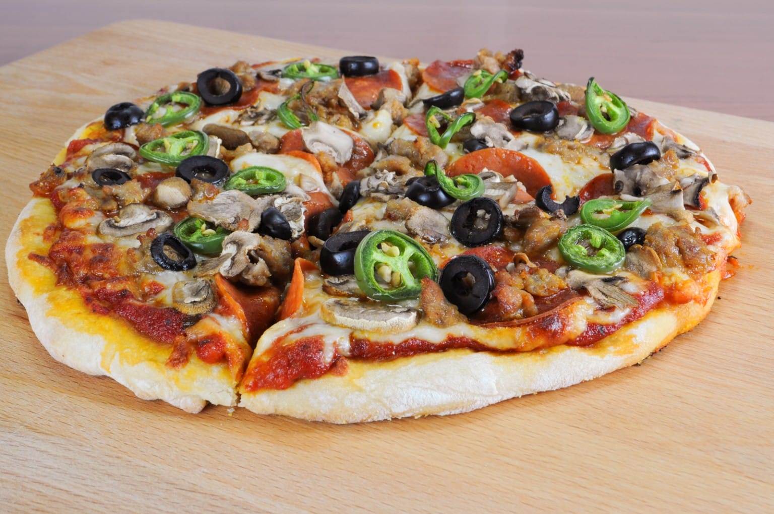 Turkey Italian Sausage, Pepperoni, Mushroom, Olive, and Jalapeno Pizza ...