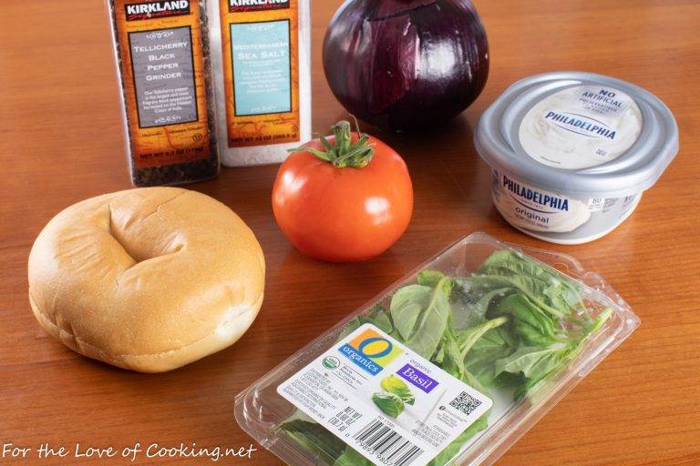 Open-Faced Bagel with Cream Cheese, Tomato, Red Onion, and Fresh Basil