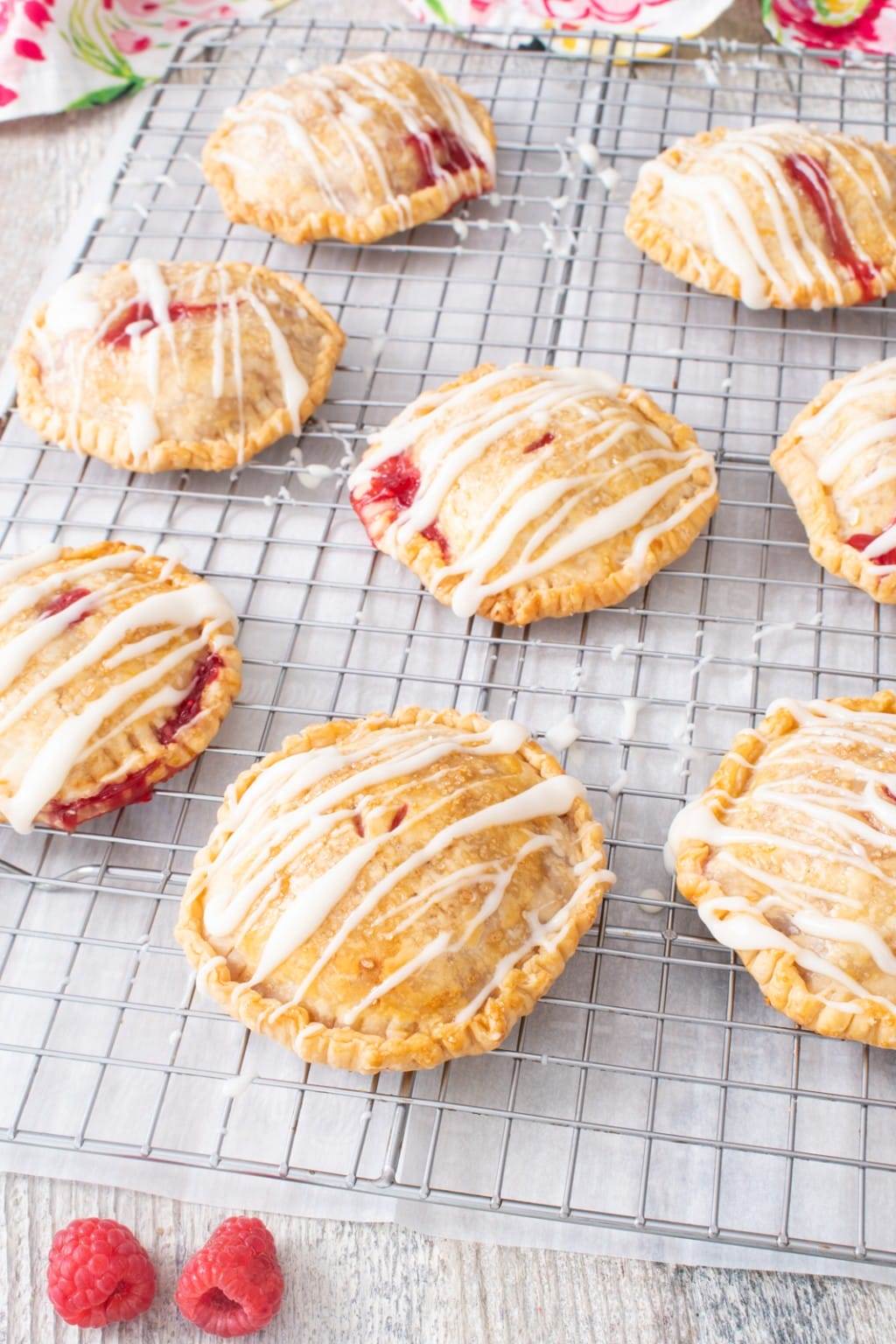 Glazed Raspberry Hand Pies | For the Love of Cooking